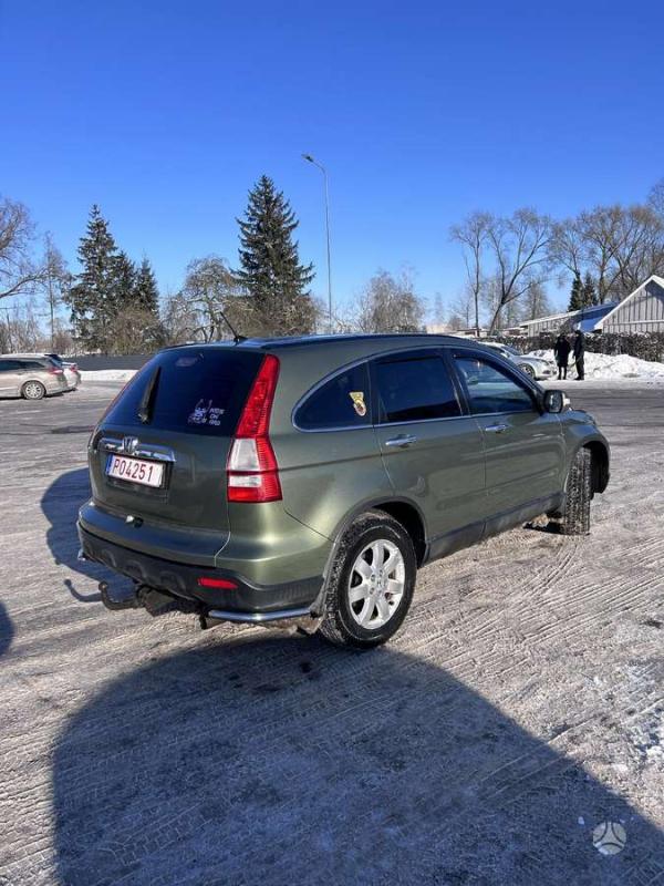 Green Honda CR-V 2007 in Ukmerge, with an engine capacity of 2.00 L and mileage of 203 thousand km for 5450 €, photo 4 on AUTOMOTO.COM.LV