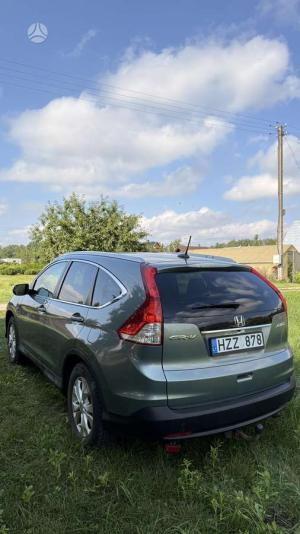 Green Honda CR-V 2012 in Panevezys, with an engine capacity of 2.35 L and mileage of 190 thousand km for 9500 €, photo  on AUTOMOTO.COM.LV