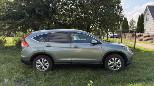 Green Honda CR-V 2012 in Panevezys, with an engine capacity of 2.35 L and mileage of 190 thousand km for 9500 €, photo 3 on AUTOMOTO.COM.LV