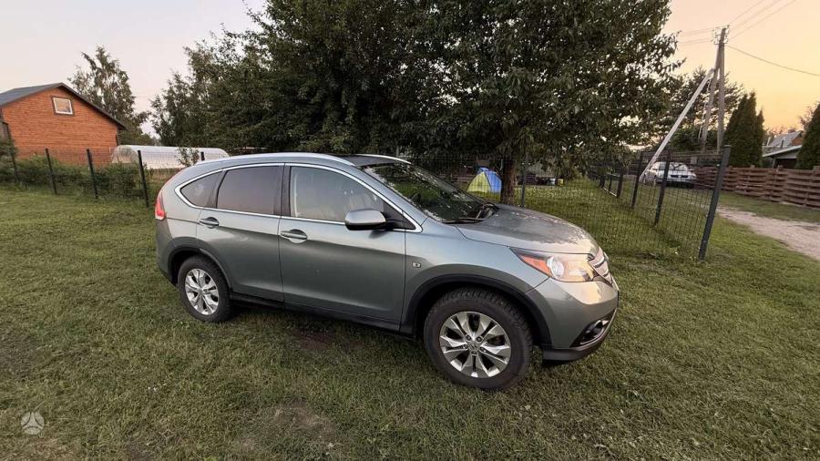 Green Honda CR-V 2012 in Panevezys, with an engine capacity of 2.35 L and mileage of 190 thousand km for 9500 €, photo 5 on AUTOMOTO.COM.LV