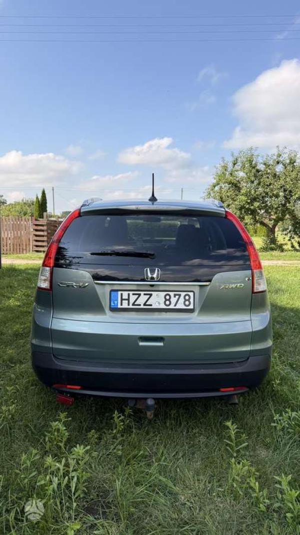 Green Honda CR-V 2012 in Panevezys, with an engine capacity of 2.35 L and mileage of 190 thousand km for 9500 €, photo 5 on AUTOMOTO.COM.LV