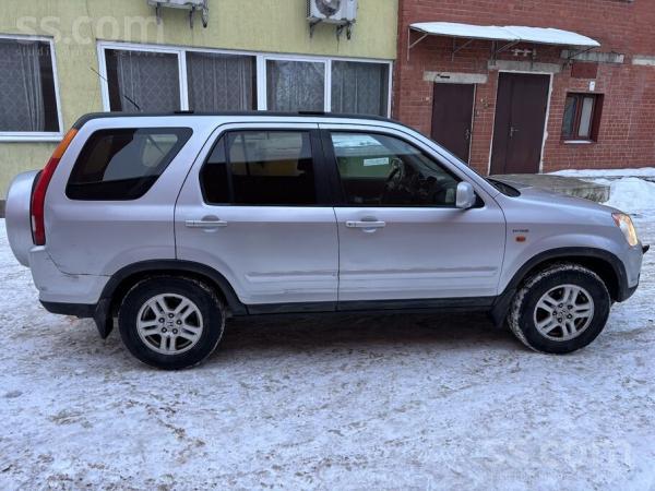Grey Honda CR-V 2002 in Bauska, with an engine capacity of 2.00 L and mileage of 339 thousand km for 1100 €, photo 6 on AUTOMOTO.COM.LV