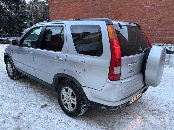 Grey Honda CR-V 2002 in Bauska, with an engine capacity of 2.00 L and mileage of 339 thousand km for 1100 €, photo 7 on AUTOMOTO.COM.LV