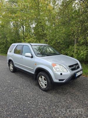 Pelēks Honda CR-V 2002 Rīga, ar dzinēja tilpumu 2.00 L un nobraukumu 249 tūkst. km par 1850 €, foto  vietnē AUTOMOTO.COM.LV