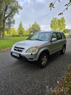 Pelēks Honda CR-V 2002 Rīga, ar dzinēja tilpumu 2.00 L un nobraukumu 249 tūkst. km par 1850 €, foto 3 vietnē AUTOMOTO.COM.LV