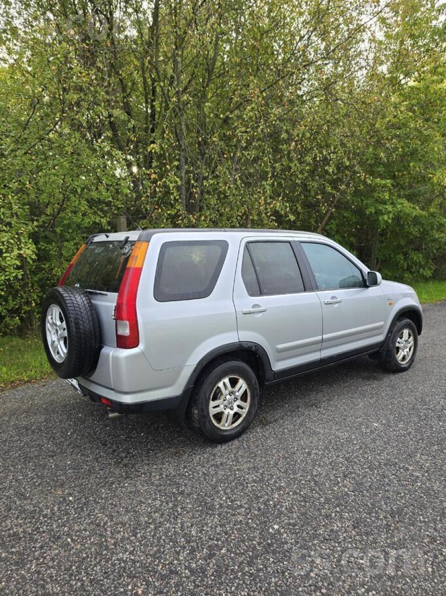 Pelēks Honda CR-V 2002 Rīga, ar dzinēja tilpumu 2.00 L un nobraukumu 249 tūkst. km par 1850 €, foto 4 vietnē AUTOMOTO.COM.LV