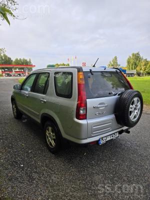 Pelēks Honda CR-V 2002 Rīga, ar dzinēja tilpumu 2.00 L un nobraukumu 249 tūkst. km par 1850 €, foto 5 vietnē AUTOMOTO.COM.LV