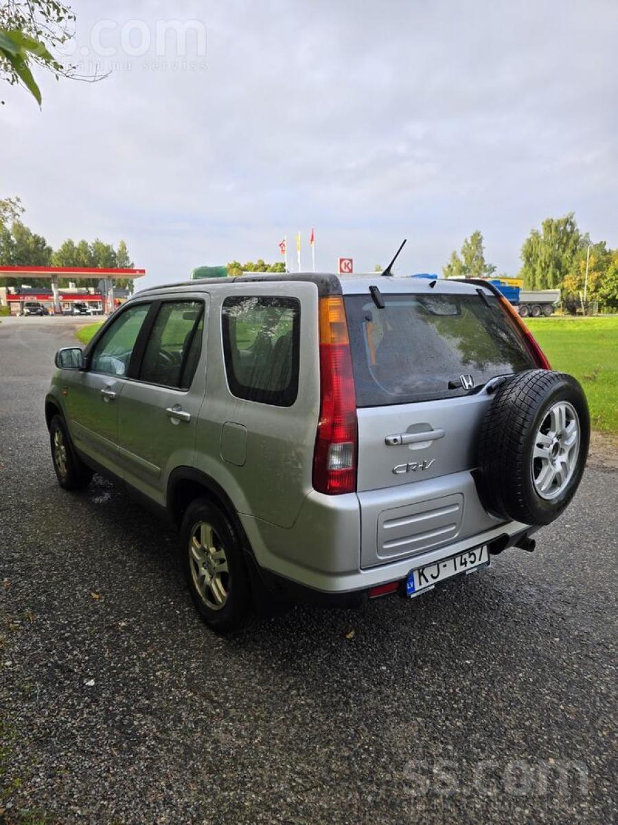 Pelēks Honda CR-V 2002 Rīga, ar dzinēja tilpumu 2.00 L un nobraukumu 249 tūkst. km par 1850 €, foto 5 vietnē AUTOMOTO.COM.LV