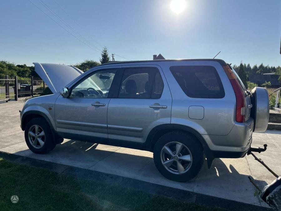 Grey Honda CR-V 2003 in Vilnius, with an engine capacity of 2.00 L and mileage of 164 thousand km for 3500 €, photo 5 on AUTOMOTO.COM.LV