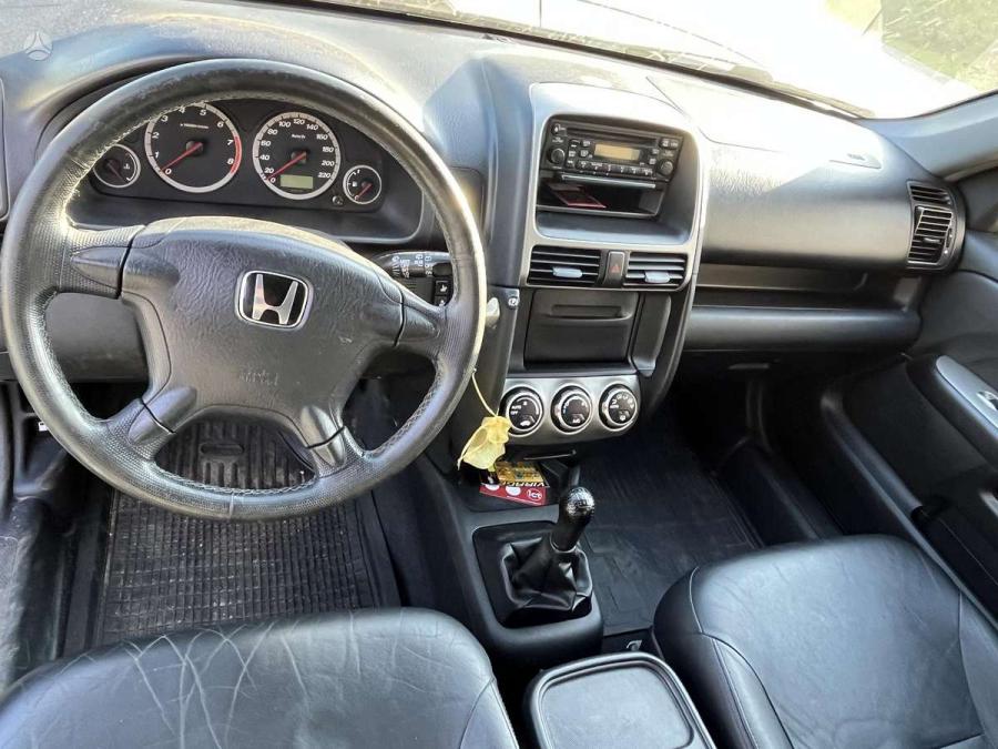 Grey Honda CR-V 2003 in Vilnius, with an engine capacity of 2.00 L and mileage of 164 thousand km for 3500 €, photo 11 on AUTOMOTO.COM.LV