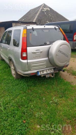 Grey Honda CR-V 2003 in Jelgava, with an engine capacity of 2.00 L and mileage of 348 thousand km for 1500 €, photo  on AUTOMOTO.COM.LV