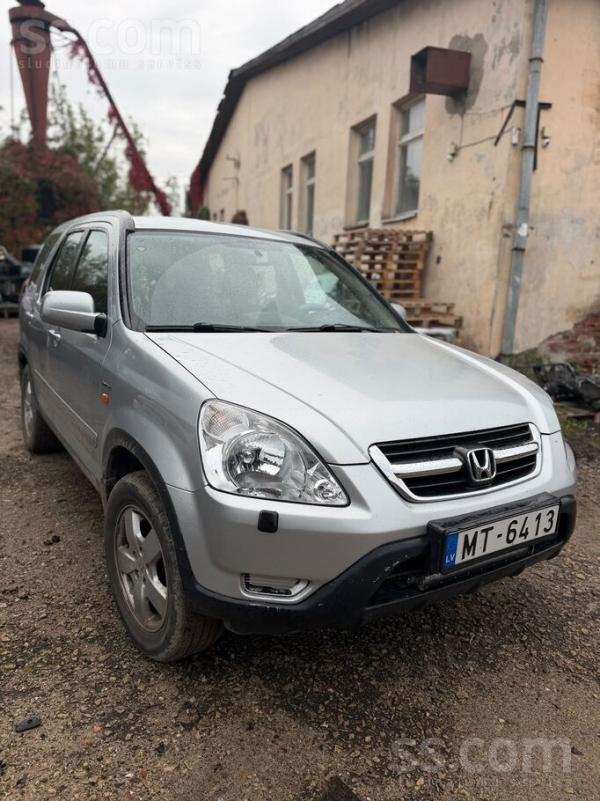 Pelēks Honda CR-V 2003 Rīga, ar dzinēja tilpumu 2.00 L un nobraukumu 305 tūkst. km par 980 €, foto 5 vietnē AUTOMOTO.COM.LV