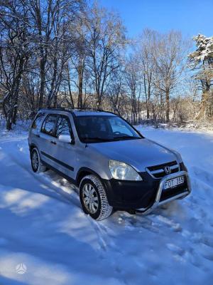 Pelēks Honda CR-V 2004 Viļņa, ar dzinēja tilpumu 2.40 L un nobraukumu 300 tūkst. km par 2500 €, foto  vietnē AUTOMOTO.COM.LV