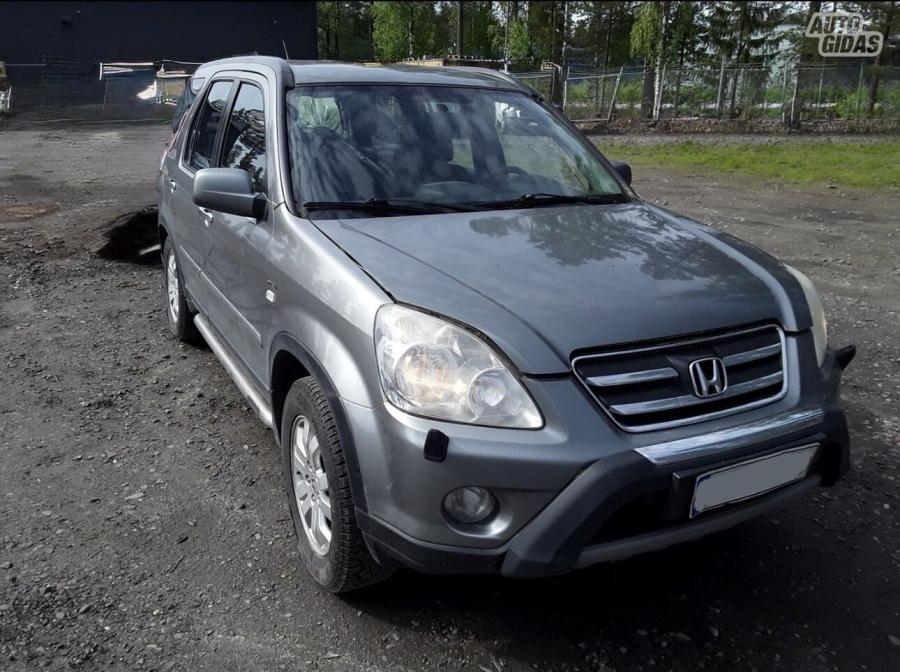 Grey Honda CR-V 2004 in Kaunas, with an engine capacity of 2.00 L and mileage of 200 thousand km for 1500 €, photo 1 on AUTOMOTO.COM.LV