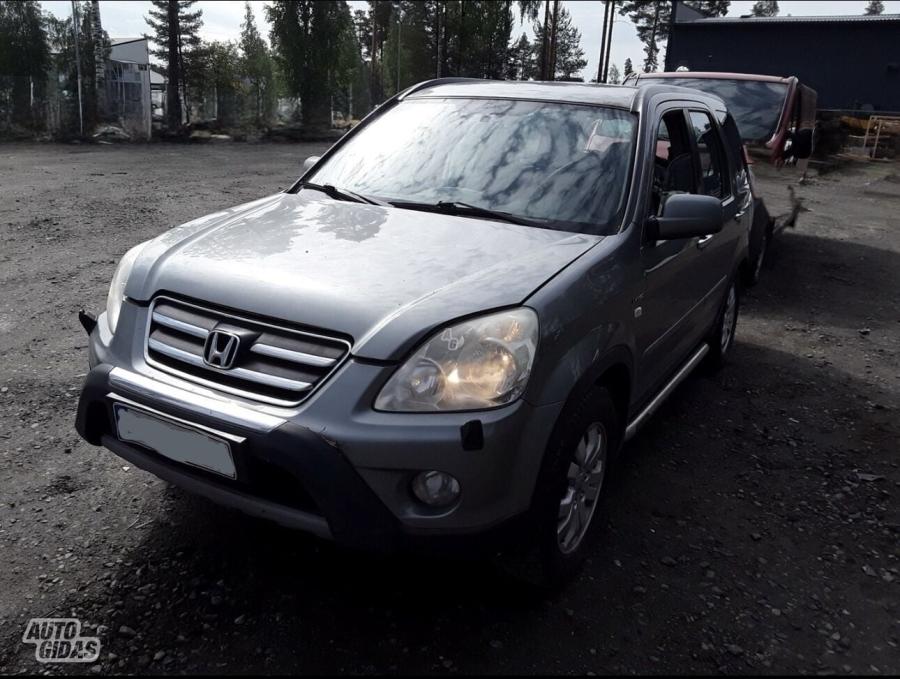 Grey Honda CR-V 2004 in Kaunas, with an engine capacity of 2.00 L and mileage of 200 thousand km for 1500 €, photo 3 on AUTOMOTO.COM.LV
