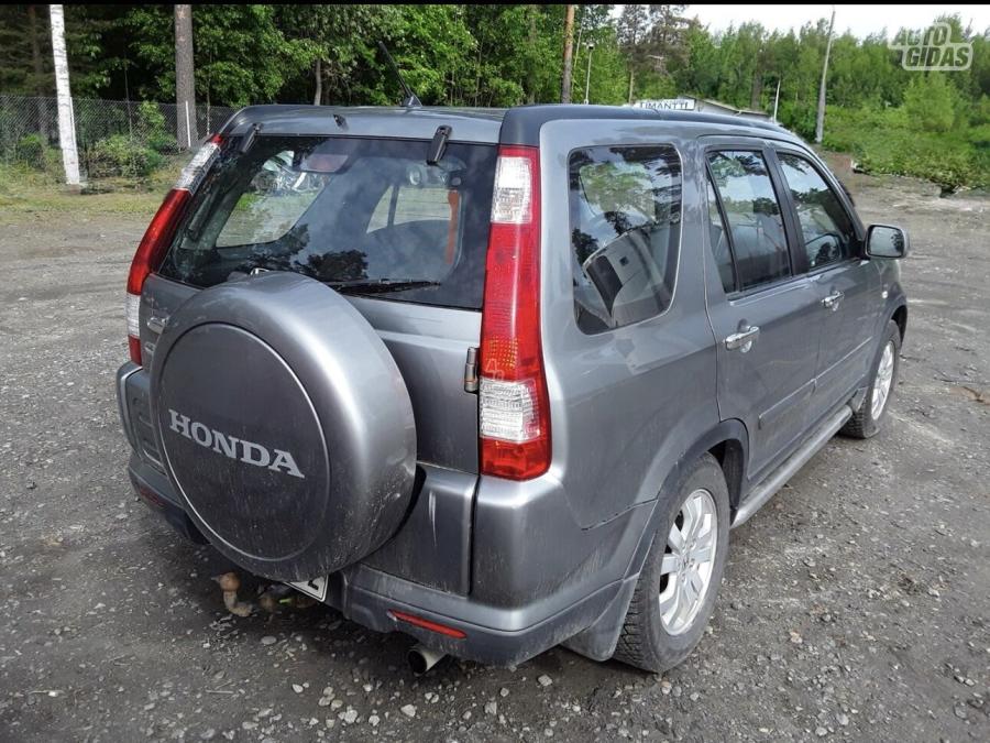 Grey Honda CR-V 2004 in Kaunas, with an engine capacity of 2.00 L and mileage of 200 thousand km for 1500 €, photo 5 on AUTOMOTO.COM.LV