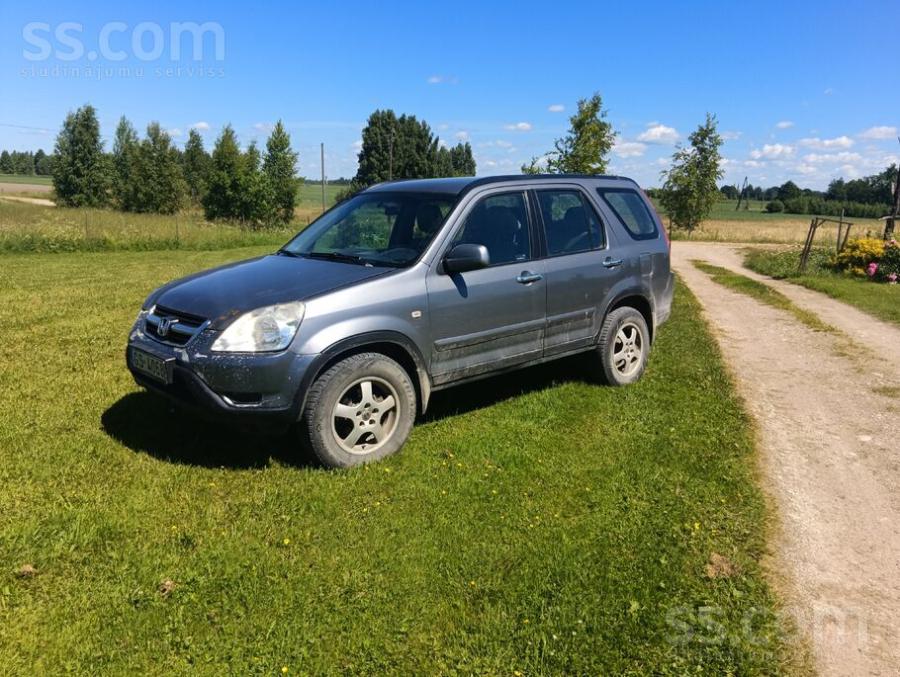 Grey Honda CR-V 2004 in Balvi, with an engine capacity of 2.00 L and mileage of 494 thousand km for 550 €, photo 3 on AUTOMOTO.COM.LV