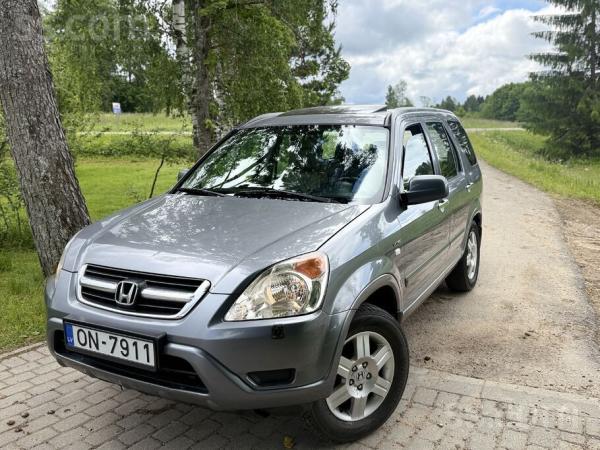 Pelēks Honda CR-V 2004 Cēsis, ar dzinēja tilpumu 2.00 L un nobraukumu 0 tūkst. km par 2200 €, foto 1 vietnē AUTOMOTO.COM.LV