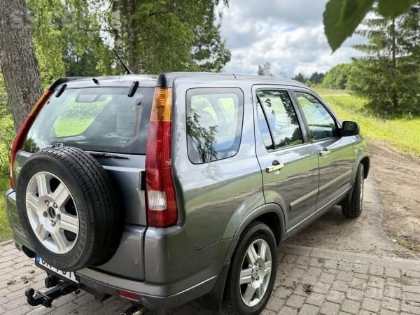 Pelēks Honda CR-V 2004 Cēsis, ar dzinēja tilpumu 2.00 L un nobraukumu 0 tūkst. km par 2200 €, foto 6 vietnē AUTOMOTO.COM.LV