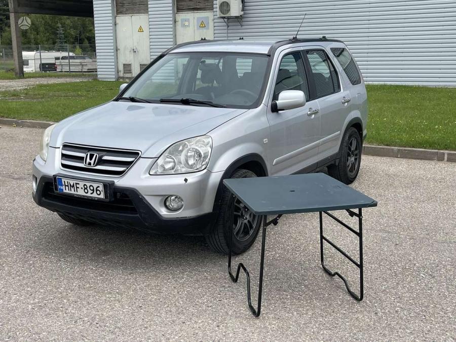 Grey Honda CR-V 2004 in Vilnius, with an engine capacity of 2.00 L and mileage of 321 thousand km for 2950 €, photo 1 on AUTOMOTO.COM.LV