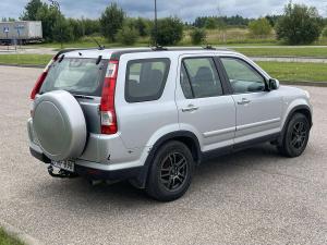 Grey Honda CR-V 2004 in Vilnius, with an engine capacity of 2.00 L and mileage of 321 thousand km for 2950 €, photo 8 on AUTOMOTO.COM.LV