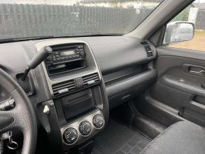 Grey Honda CR-V 2004 in Vilnius, with an engine capacity of 2.00 L and mileage of 321 thousand km for 2950 €, photo 12 on AUTOMOTO.COM.LV