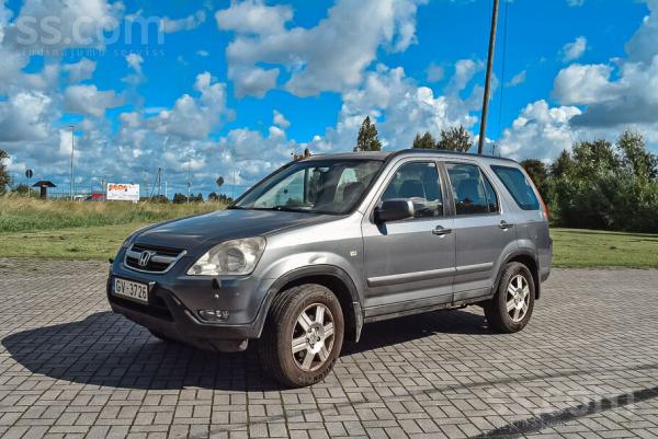 Grey Honda CR-V 2004 in Riga, with an engine capacity of 2.00 L and mileage of 153 thousand km for 2900 €, photo 1 on AUTOMOTO.COM.LV