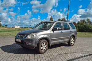 Grey Honda CR-V 2004 in Riga, with an engine capacity of 2.00 L and mileage of 153 thousand km for 2900 €, photo  on AUTOMOTO.COM.LV
