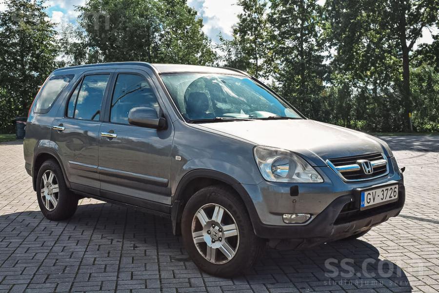 Grey Honda CR-V 2004 in Riga, with an engine capacity of 2.00 L and mileage of 153 thousand km for 2900 €, photo 4 on AUTOMOTO.COM.LV