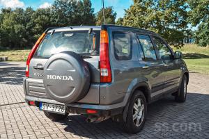 Grey Honda CR-V 2004 in Riga, with an engine capacity of 2.00 L and mileage of 153 thousand km for 2900 €, photo 5 on AUTOMOTO.COM.LV