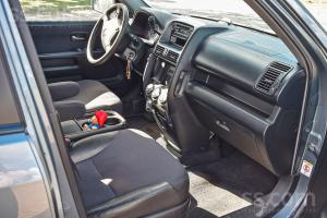 Grey Honda CR-V 2004 in Riga, with an engine capacity of 2.00 L and mileage of 153 thousand km for 2900 €, photo 14 on AUTOMOTO.COM.LV