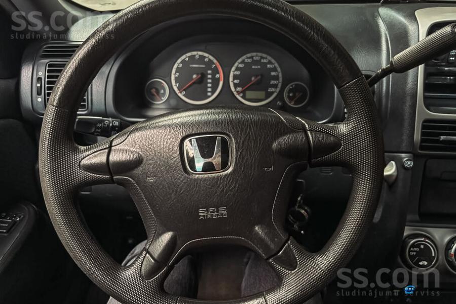 Grey Honda CR-V 2004 in Riga, with an engine capacity of 2.00 L and mileage of 153 thousand km for 2900 €, photo 18 on AUTOMOTO.COM.LV