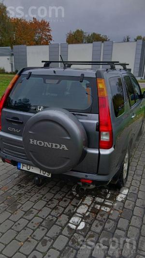 Grey Honda CR-V 2004 in Riga, with an engine capacity of 2.00 L and mileage of 289 thousand km for 2200 €, photo 5 on AUTOMOTO.COM.LV