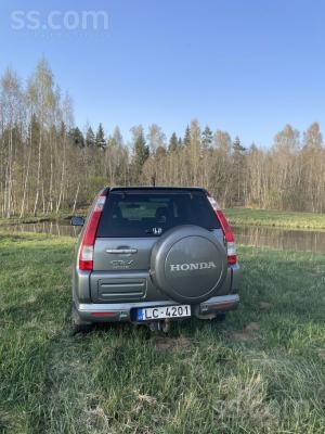 Pelēks Honda CR-V 2005 Rēzekne, ar dzinēja tilpumu 2.20 L un nobraukumu 360 tūkst. km par 2100 €, foto 3 vietnē AUTOMOTO.COM.LV