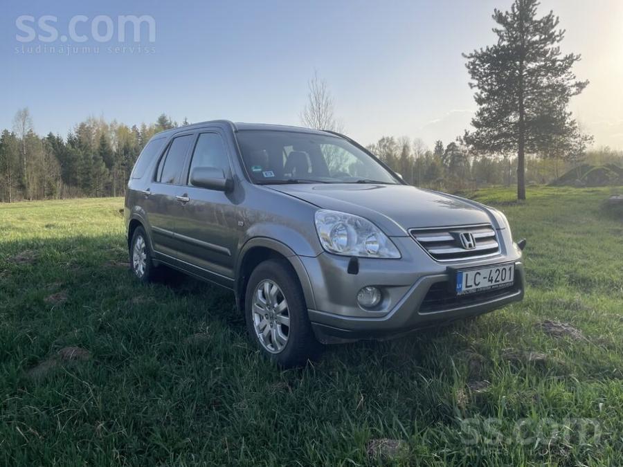 Pelēks Honda CR-V 2005 Rēzekne, ar dzinēja tilpumu 2.20 L un nobraukumu 360 tūkst. km par 2100 €, foto 5 vietnē AUTOMOTO.COM.LV