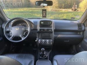 Pelēks Honda CR-V 2005 Rēzekne, ar dzinēja tilpumu 2.20 L un nobraukumu 360 tūkst. km par 2100 €, foto 7 vietnē AUTOMOTO.COM.LV
