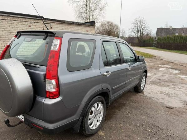 Grey Honda CR-V 2005 in Mazeikiai, with an engine capacity of 2.20 L and mileage of 275 thousand km for 3350 €, photo 6 on AUTOMOTO.COM.LV