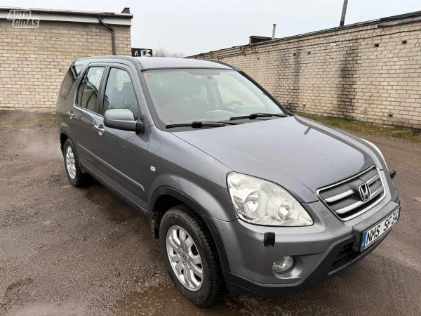Grey Honda CR-V 2005 in Mazeikiai, with an engine capacity of 2.20 L and mileage of 275 thousand km for 3350 €, photo 7 on AUTOMOTO.COM.LV