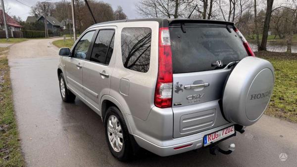 Pelēks Honda CR-V 2005 Kelmė, ar dzinēja tilpumu 2.20 L un nobraukumu 270 tūkst. km par 3700 €, foto 6 vietnē AUTOMOTO.COM.LV