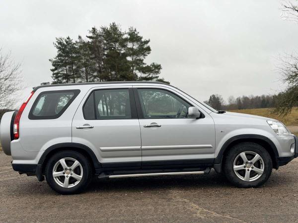 Pelēks Honda CR-V 2005 Utena, ar dzinēja tilpumu 2.20 L un nobraukumu 446 tūkst. km par 2999 €, foto 8 vietnē AUTOMOTO.COM.LV