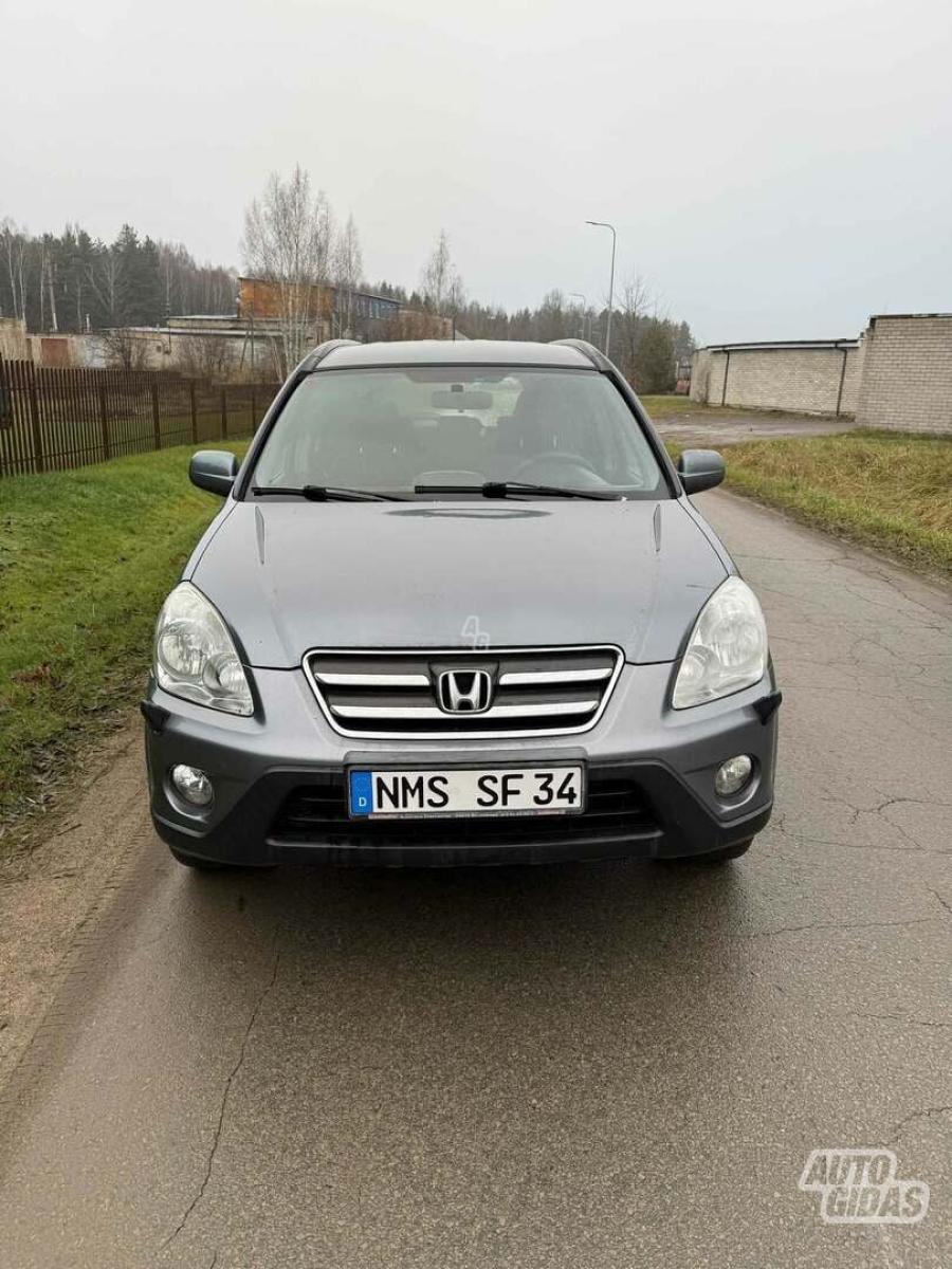 Pelēks Honda CR-V 2005 Mažeikiai, ar dzinēja tilpumu 2.20 L un nobraukumu 275 tūkst. km par 3400 €, foto 5 vietnē AUTOMOTO.COM.LV