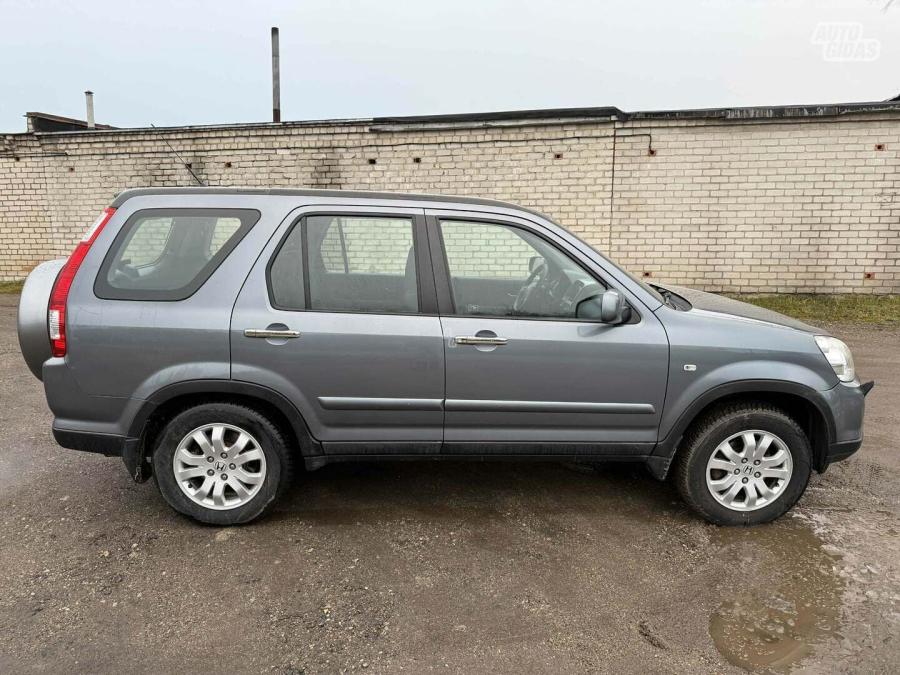 Pelēks Honda CR-V 2005 Mažeikiai, ar dzinēja tilpumu 2.20 L un nobraukumu 275 tūkst. km par 3400 €, foto 8 vietnē AUTOMOTO.COM.LV