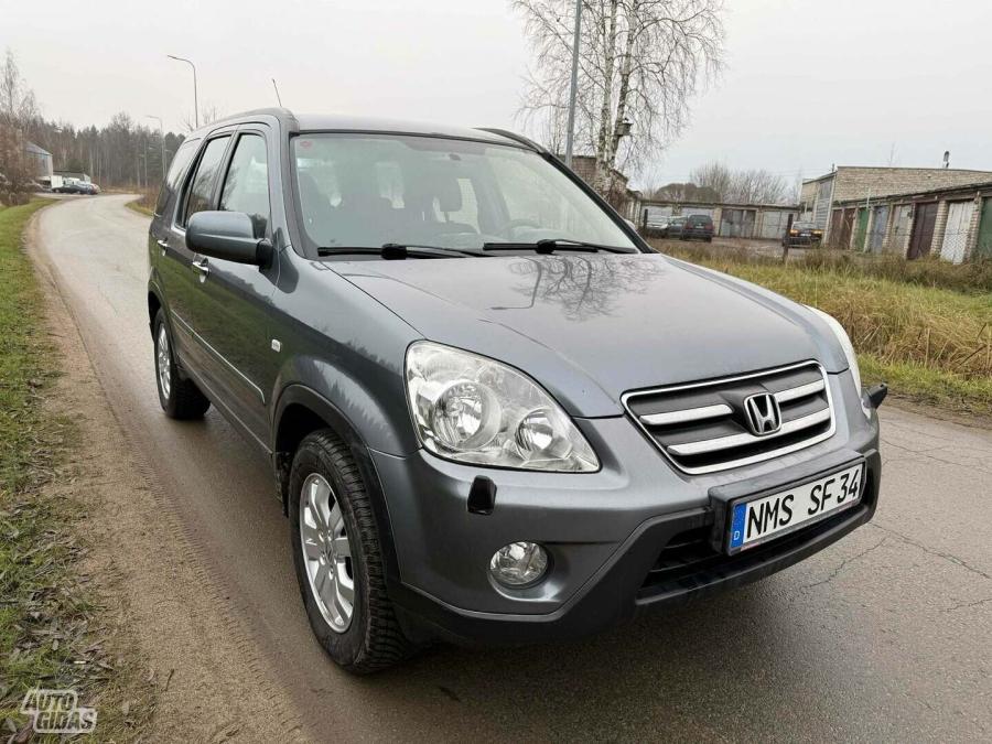 Pelēks Honda CR-V 2005 Mažeikiai, ar dzinēja tilpumu 2.20 L un nobraukumu 275 tūkst. km par 3400 €, foto 15 vietnē AUTOMOTO.COM.LV