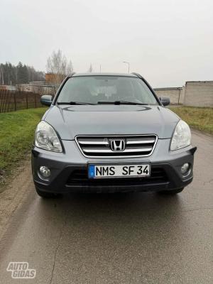 Pelēks Honda CR-V 2005 Mažeikiai, ar dzinēja tilpumu 2.20 L un nobraukumu 275 tūkst. km par 3400 €, foto 16 vietnē AUTOMOTO.COM.LV