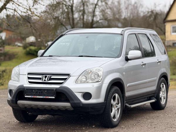 Grey Honda CR-V 2005 in Utena, with an engine capacity of 2.20 L and mileage of 446 thousand km for 2999 €, photo 1 on AUTOMOTO.COM.LV