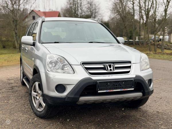 Grey Honda CR-V 2005 in Utena, with an engine capacity of 2.20 L and mileage of 446 thousand km for 2999 €, photo 4 on AUTOMOTO.COM.LV