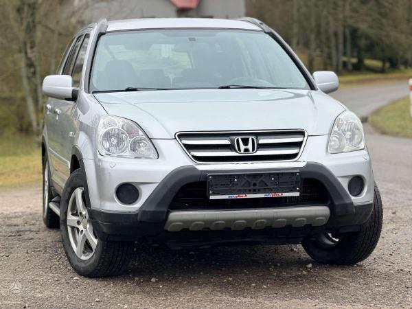 Grey Honda CR-V 2005 in Utena, with an engine capacity of 2.20 L and mileage of 446 thousand km for 2999 €, photo 7 on AUTOMOTO.COM.LV