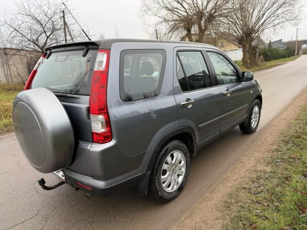 Grey Honda CR-V 2005 in Mazeikiai, with an engine capacity of 2.20 L and mileage of 275 thousand km for 3400 €, photo 3 on AUTOMOTO.COM.LV