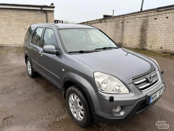 Grey Honda CR-V 2005 in Mazeikiai, with an engine capacity of 2.20 L and mileage of 275 thousand km for 3400 €, photo 9 on AUTOMOTO.COM.LV