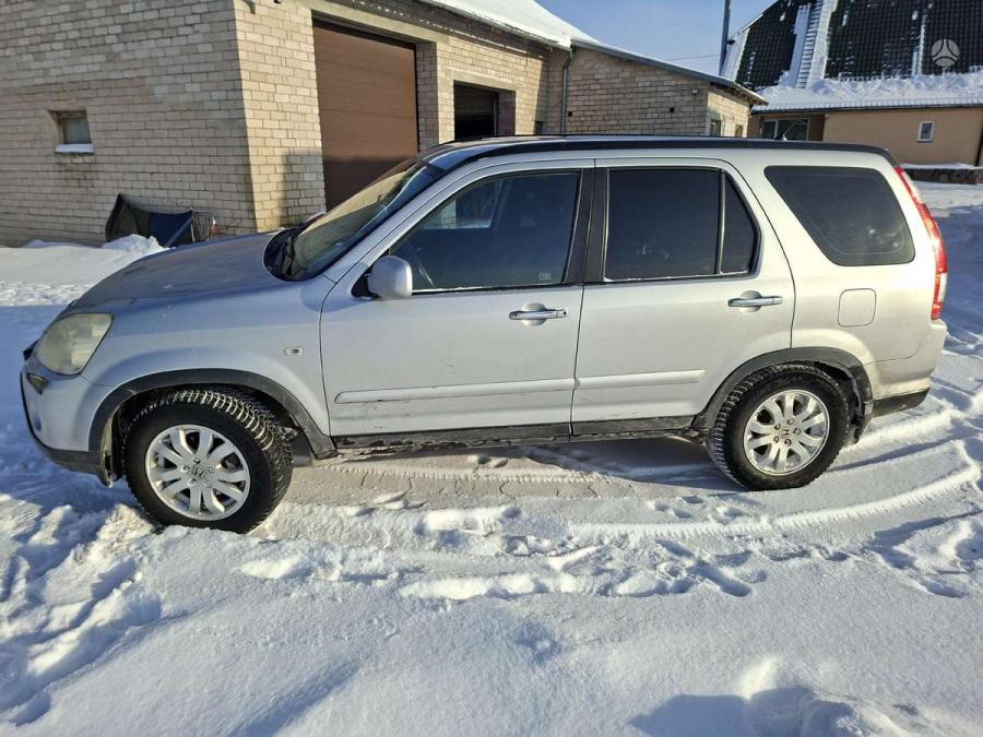 Pelēks Honda CR-V 2005 Biržai, ar dzinēja tilpumu 2.20 L un nobraukumu 300 tūkst. km par 2600 €, foto 5 vietnē AUTOMOTO.COM.LV